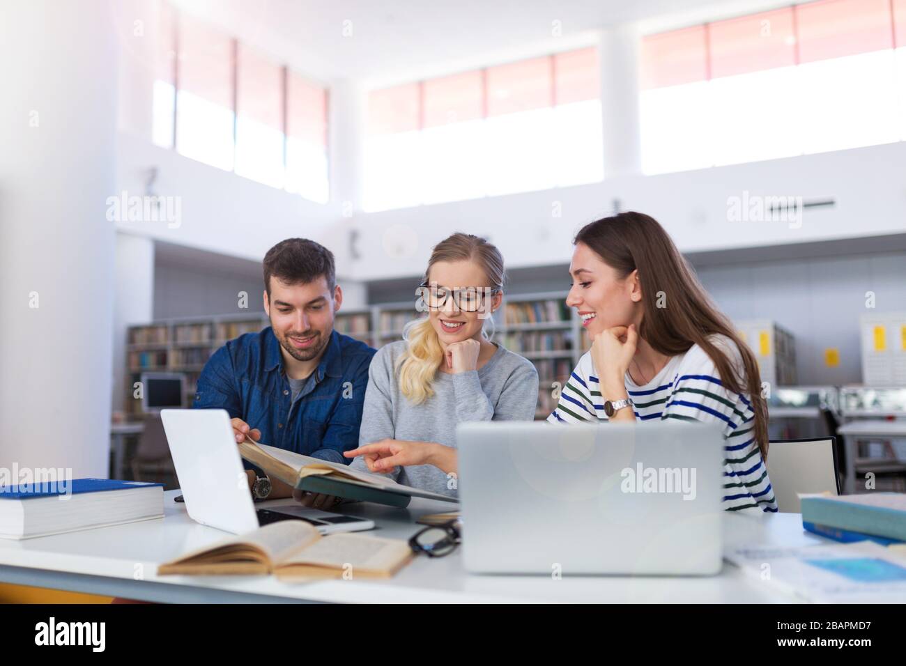 Happy students university campus hi-res stock photography and images ...