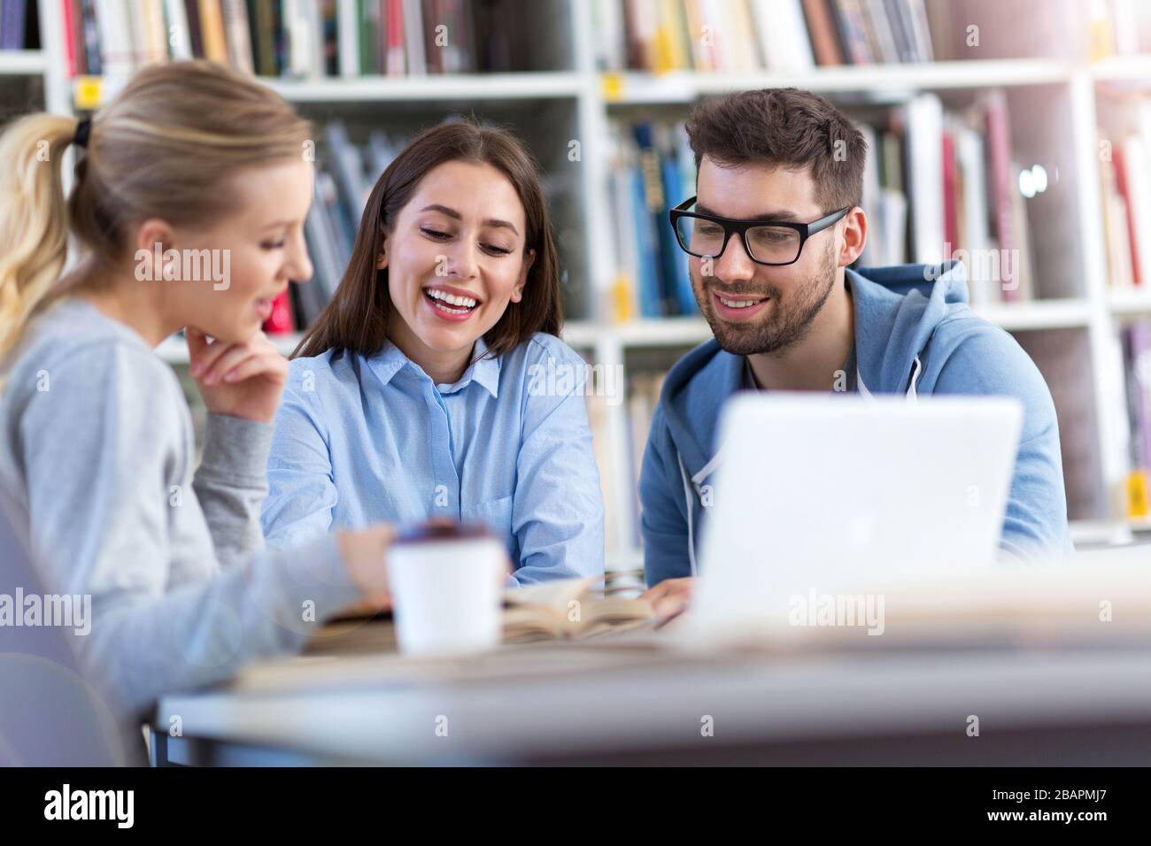 University students working in the library at campus Stock Photo - Alamy