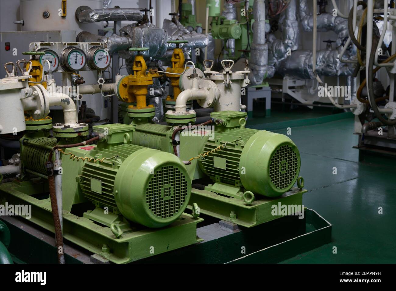 Engine room interior of a big ocean going ship with electrical motors ...