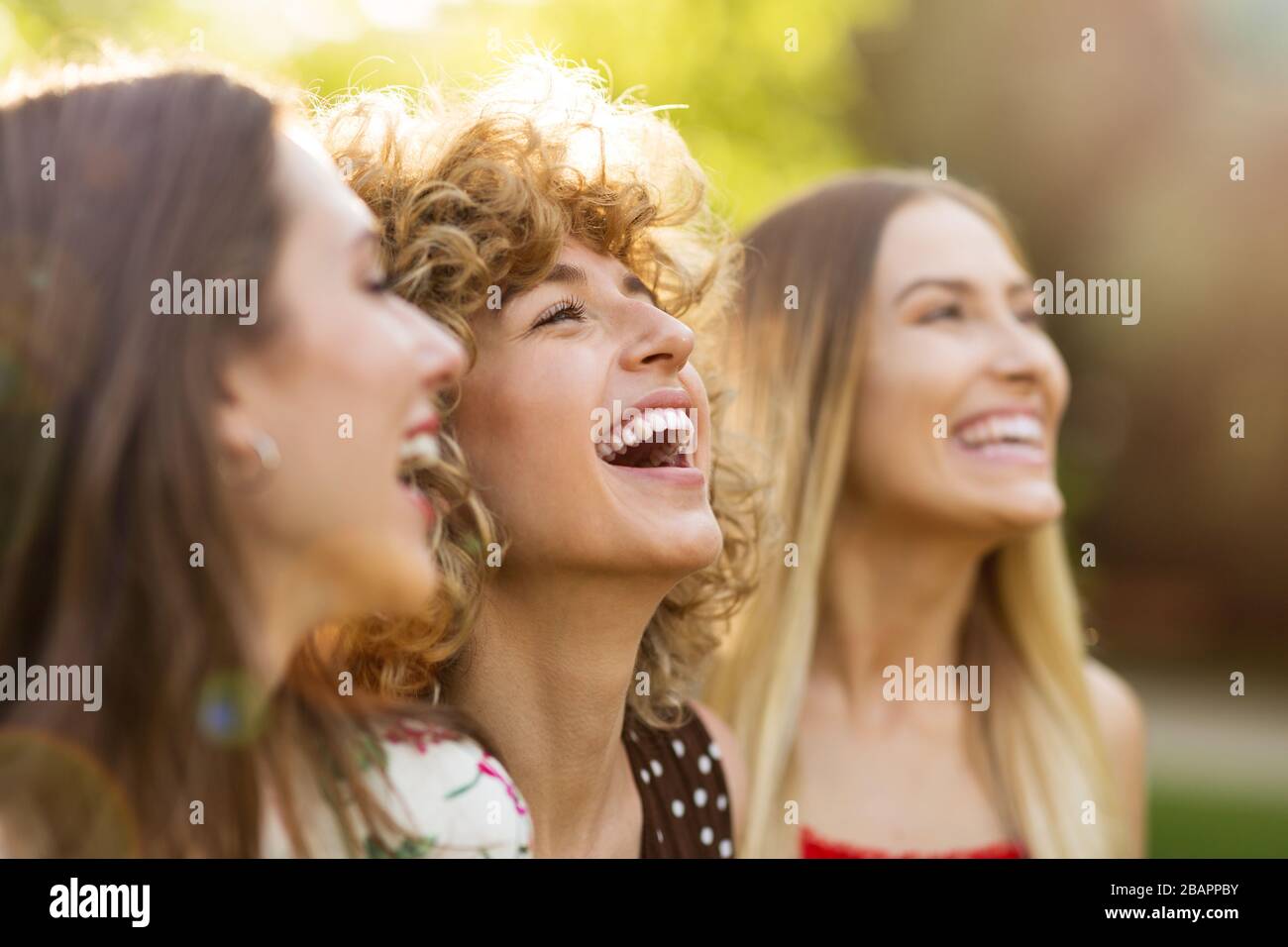 Three Beautiful Young Women Friends Stock Photo - Alamy
