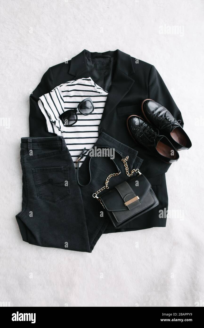 overhead flat lay view woman clothes black and white Stock Photo - Alamy