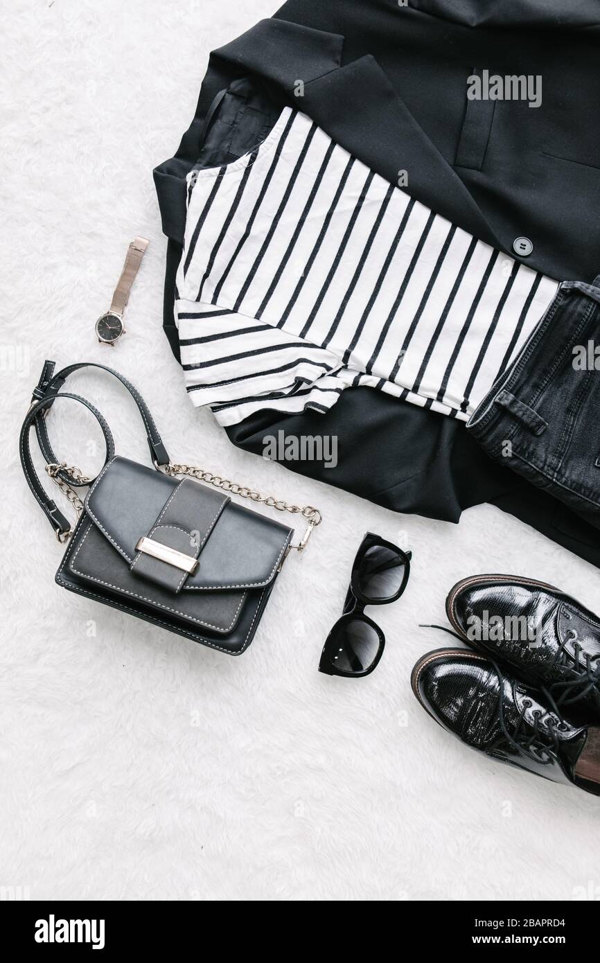 overhead flat lay view woman clothes black and white Stock Photo - Alamy