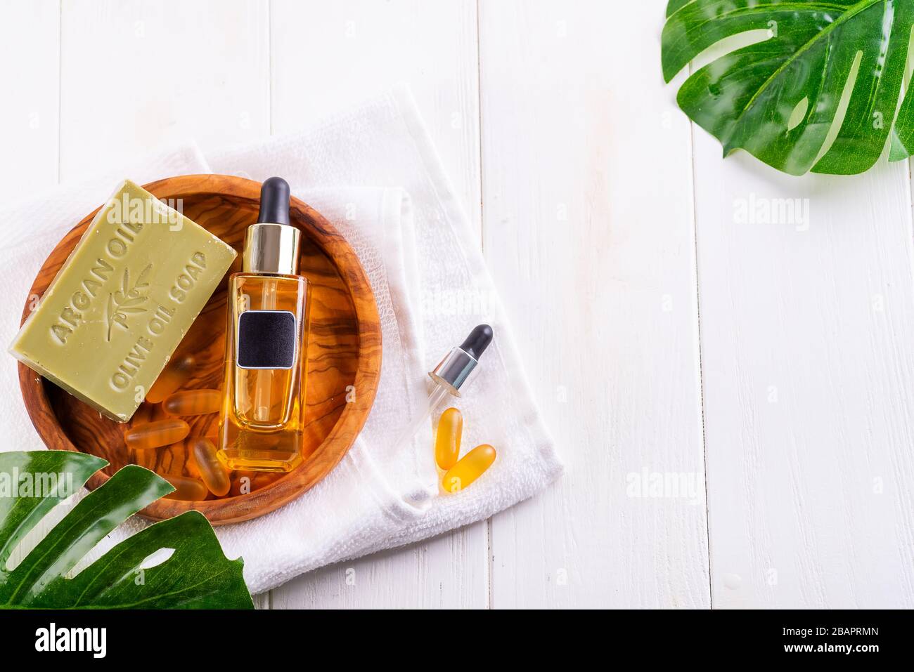 Cosmetic bottle with serum or hyaluronic acid and olive soap, Omega-3 ...