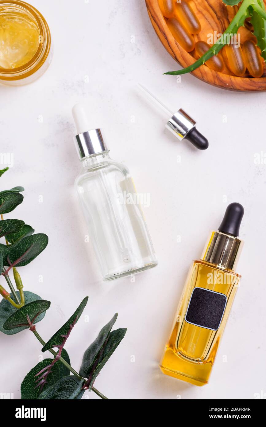 Beauty natural products with cosmetic cream, Omega-3 gel capsules, and ...