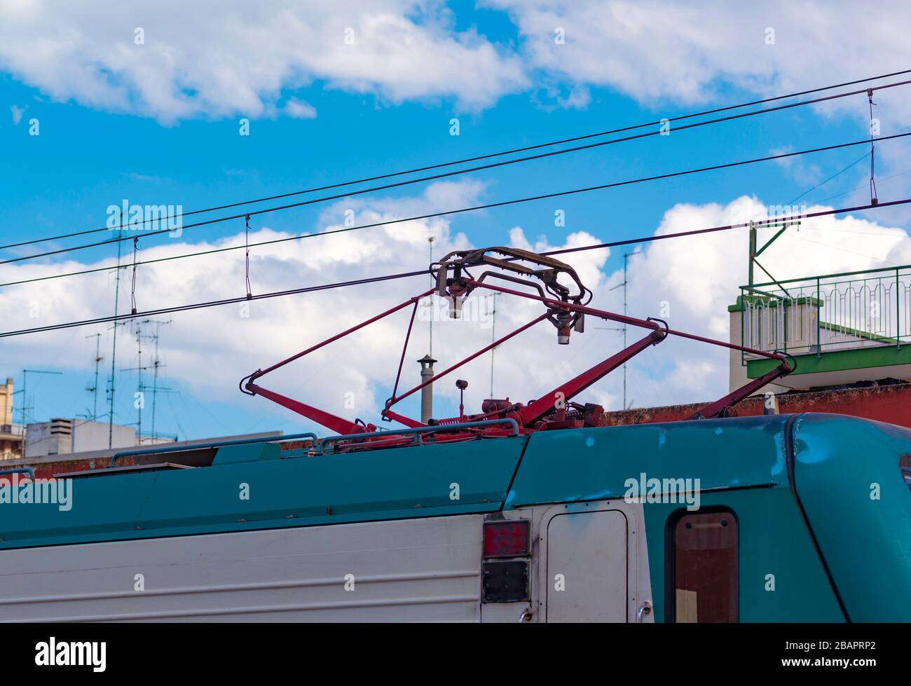 An asymmetrical pantograph connecting the train to the overhead ...