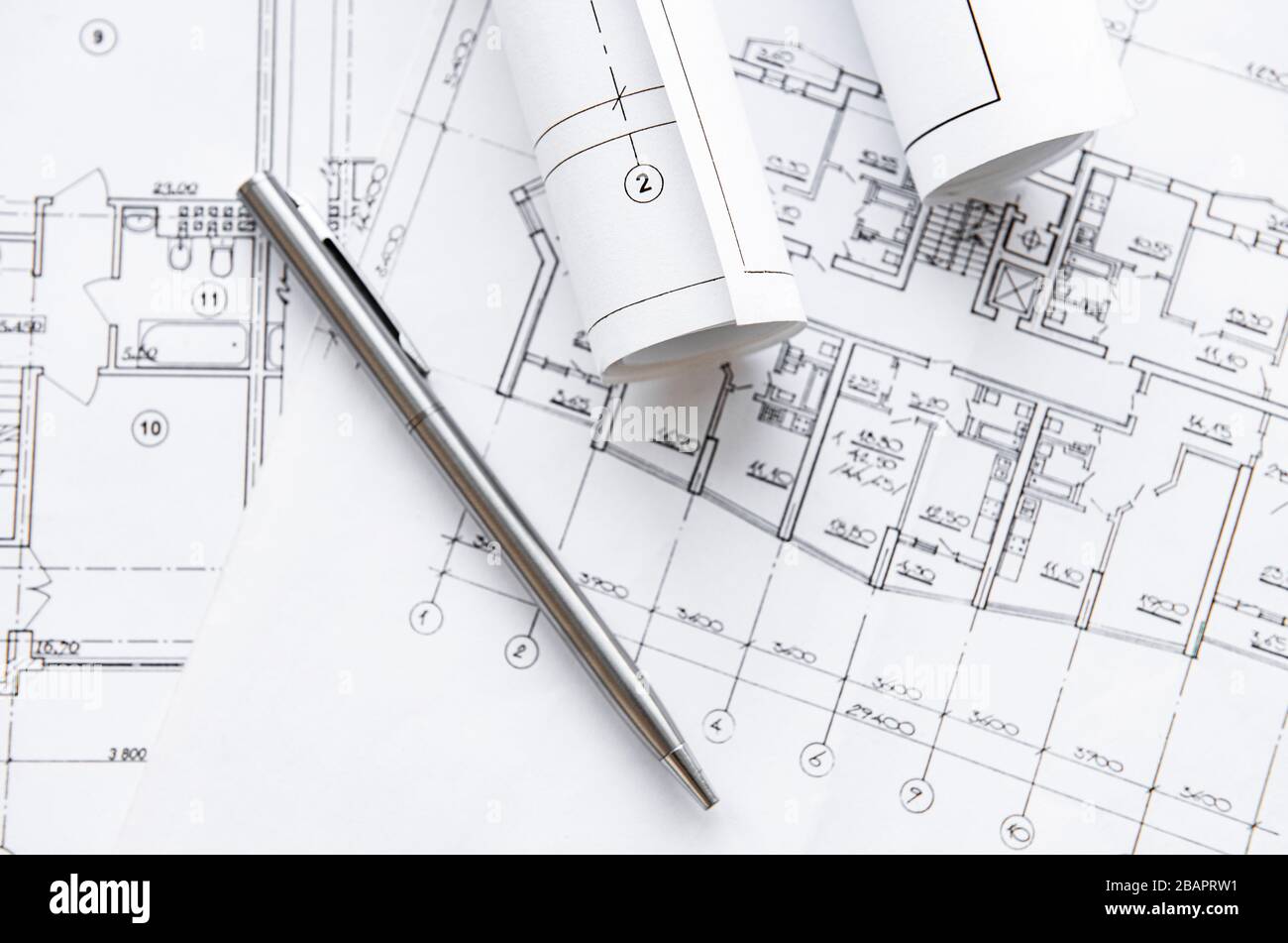 Architect workplace top view. Architectural project, blueprints ...
