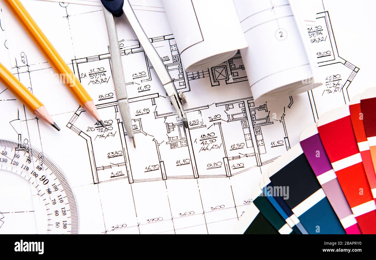 Architect workplace top view. Architectural project, blueprints ...