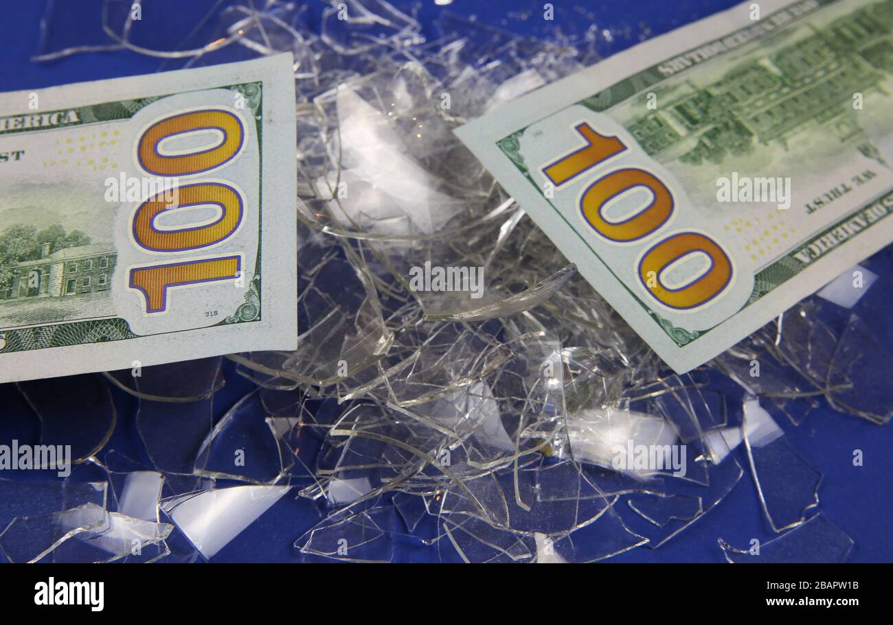 Economic crisis and stock market crash concept: two fifty dollar paper ...