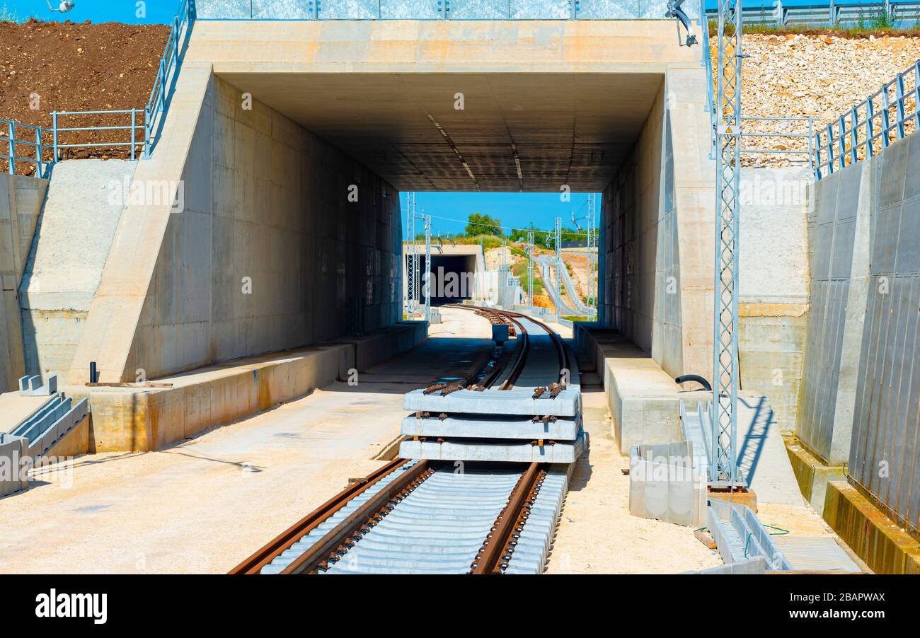 Underpass and tunnel for the construction of a new railway line. Detail ...