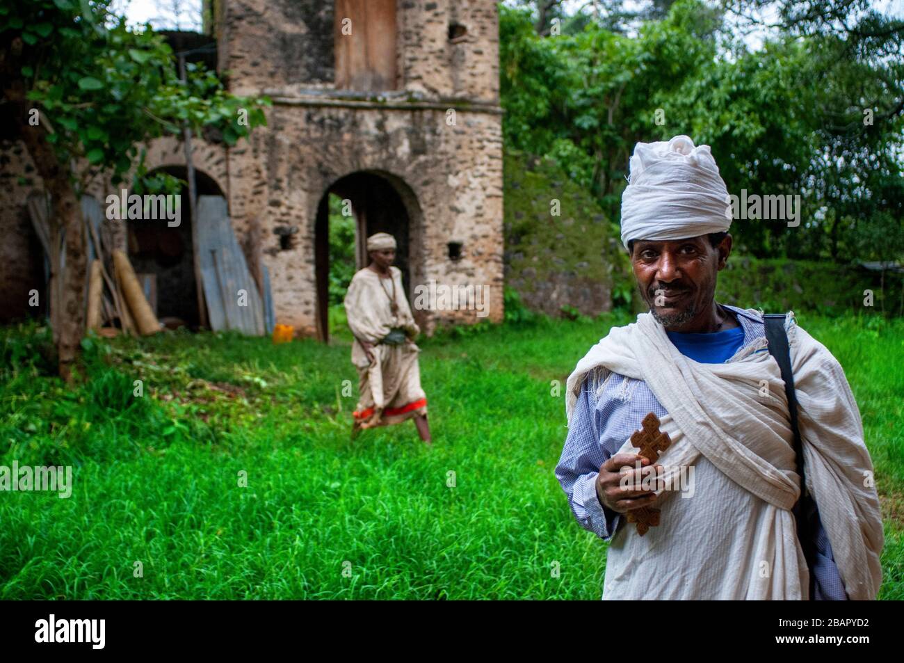 Debre Sina Beta Maryam church, Lake Tana, Bahir Dar, Ethiopia. A priest ...