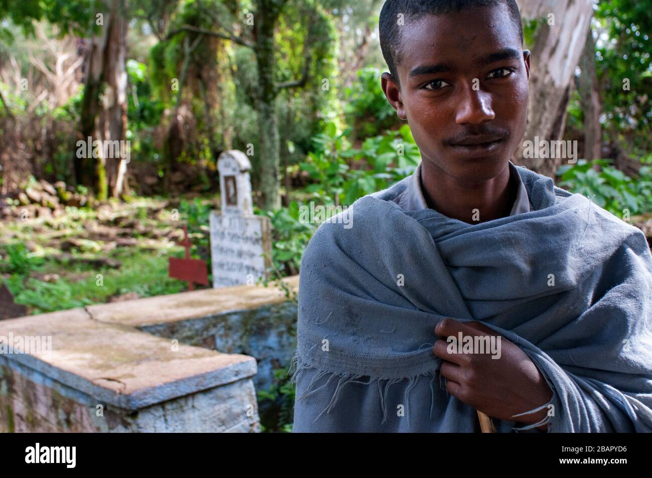 Debre Sina Beta Maryam church, Lake Tana, Bahir Dar, Ethiopia. A priest ...