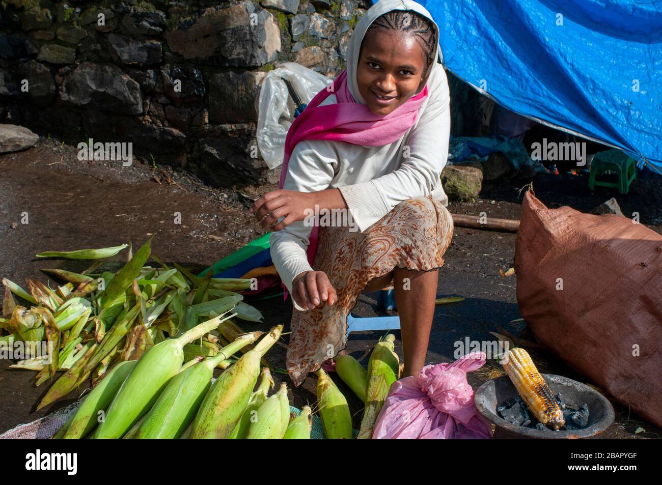 Street scene and food vendors in Gondar city, Ethiopia. Gondar is one ...