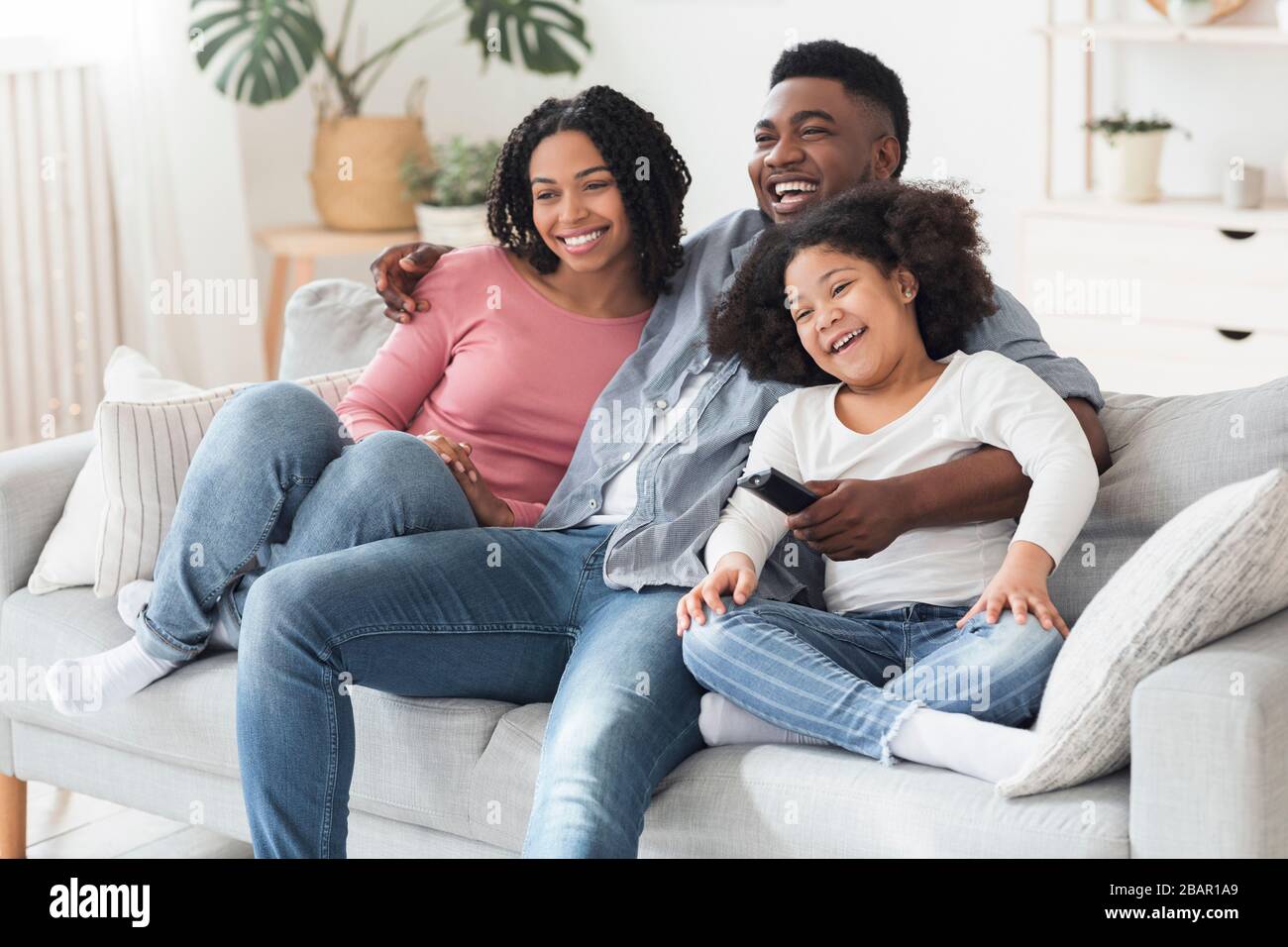 Black Family Watching Tv Together