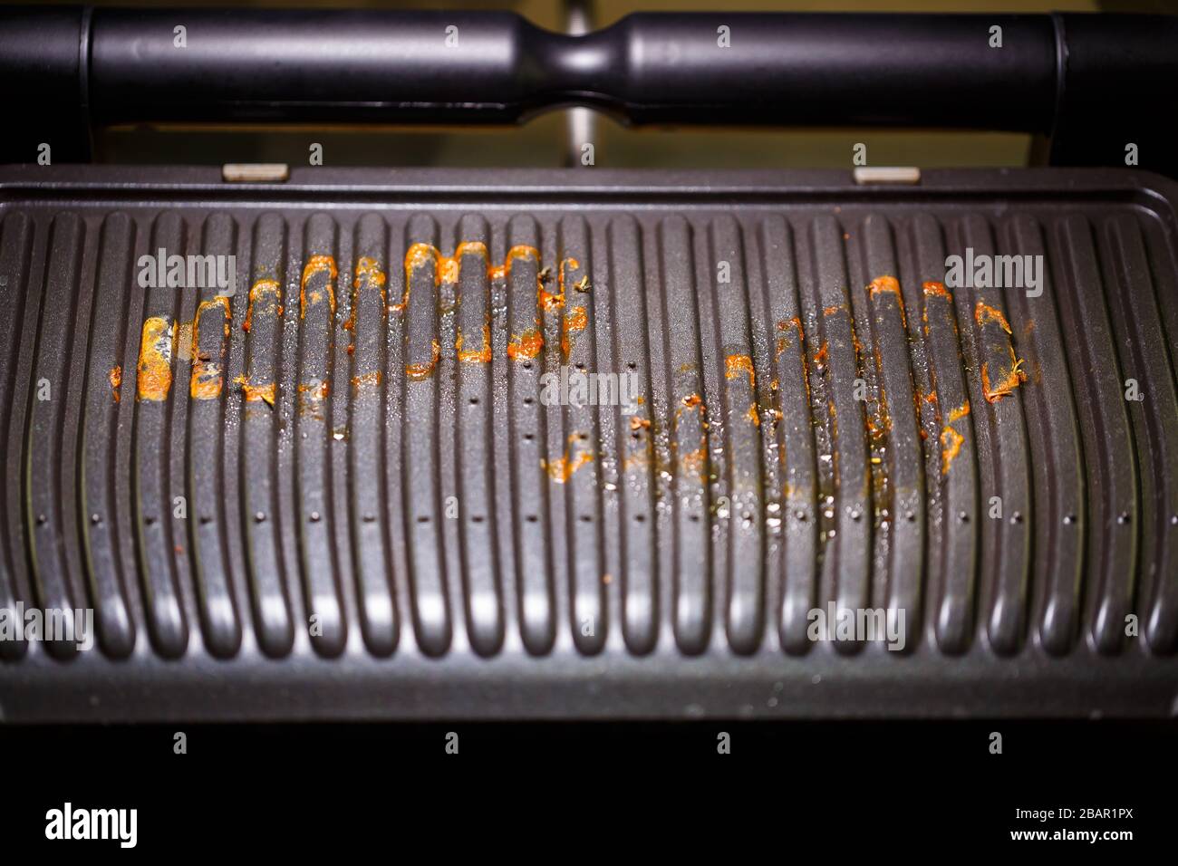 Dirty electric grill after use by the cook. Cooking at home Stock Photo ...