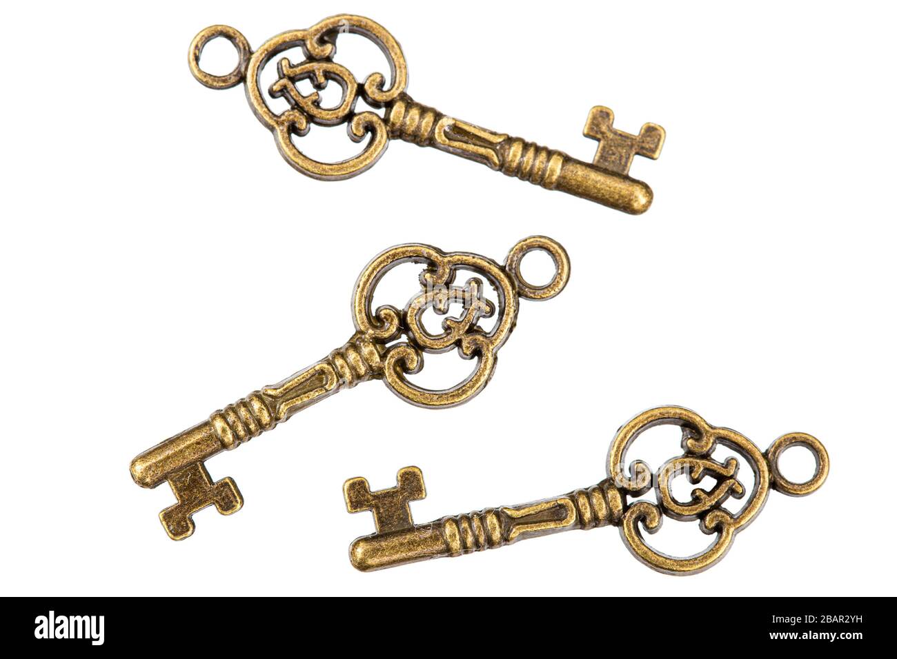 Set of bronze keys, decorative element for design, isolated on white ...