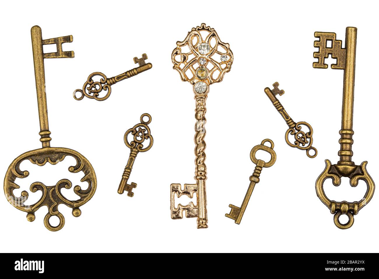 Set of bronze keys, decorative element for design, isolated on white ...