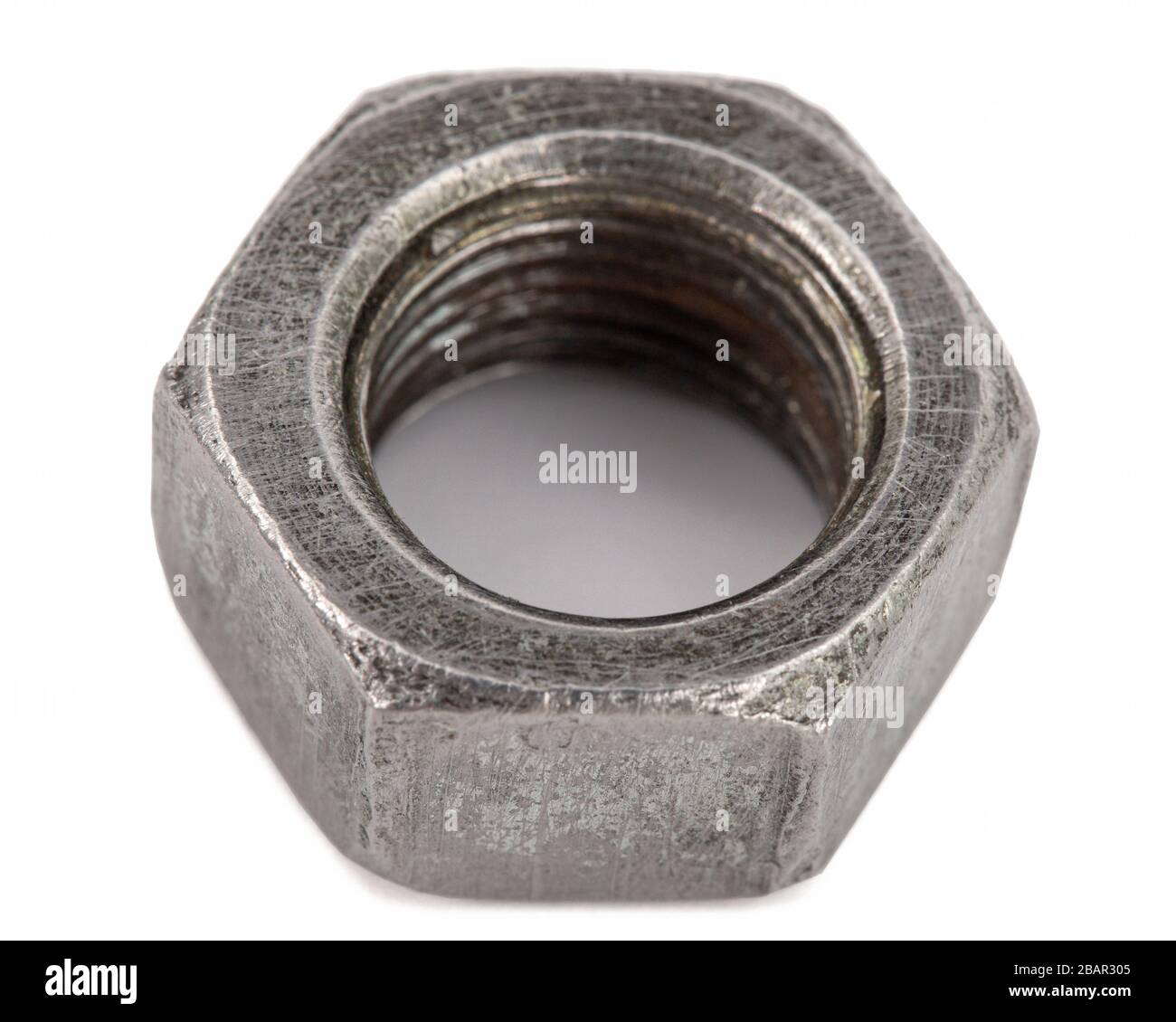 Metal nut closeup, isolated on white background Stock Photo - Alamy