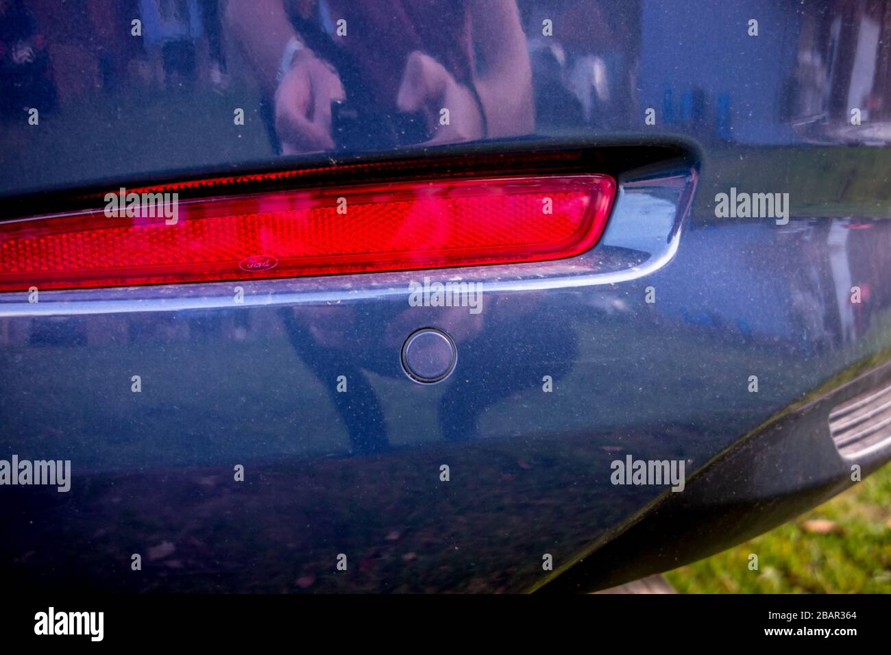 Parking Assistance - Parking sensors mounted on car bumper. Rear, front ...