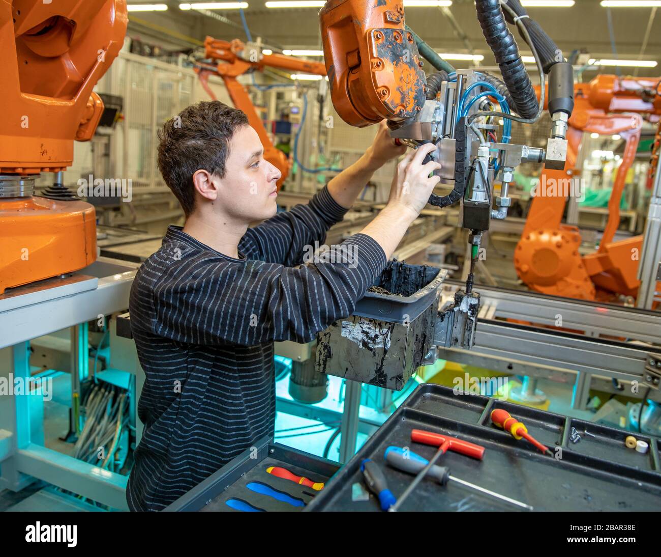 basic maintenance of robotic arms in the factory Stock Photo - Alamy