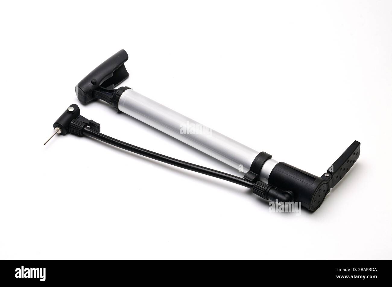 Pump and needle for inflating air on an isolated white background Stock ...