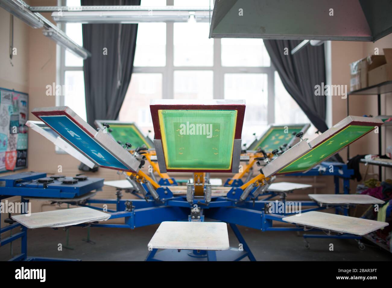 Silk screen printing. Serigraphy. Color paints and fabric. Carousel ...