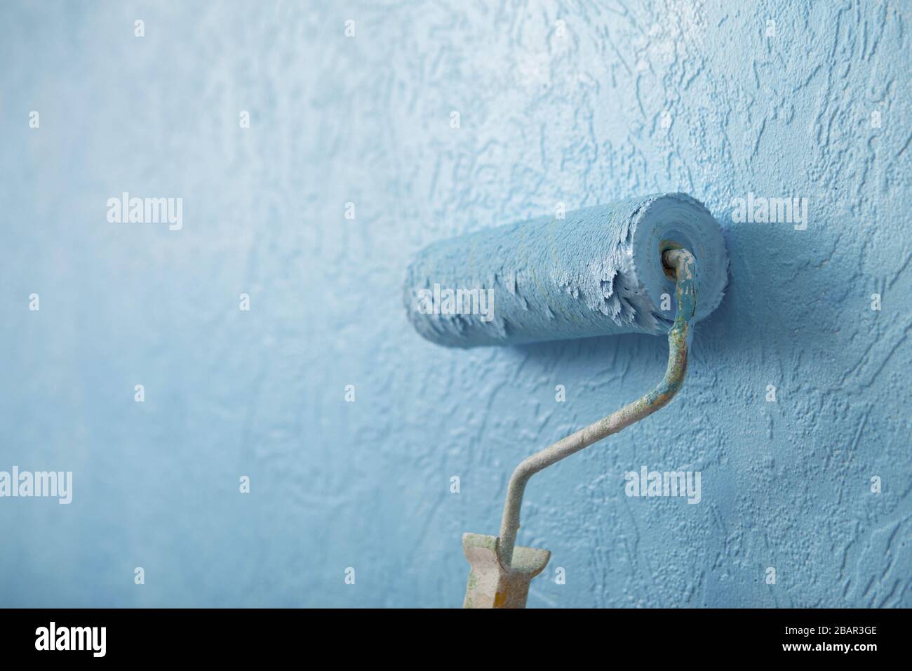Paint roller colour wall texture in blue Stock Photo - Alamy