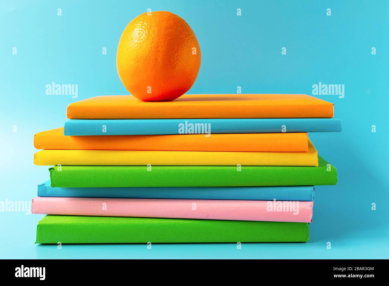 A stack of books, textbooks. Distance learning. Schoolboy is doing ...