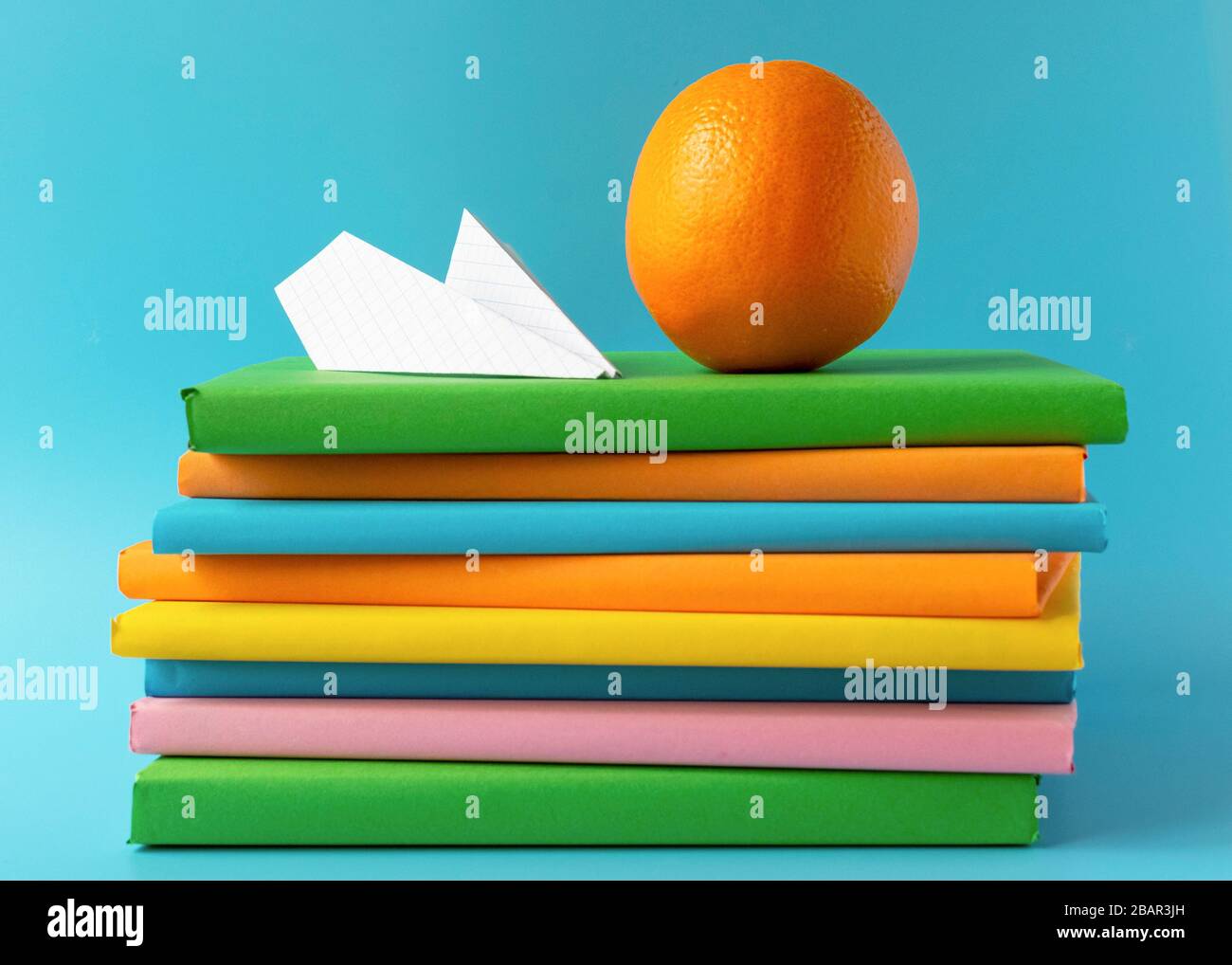 A stack of books, textbooks. Distance learning. Schoolboy is doing ...