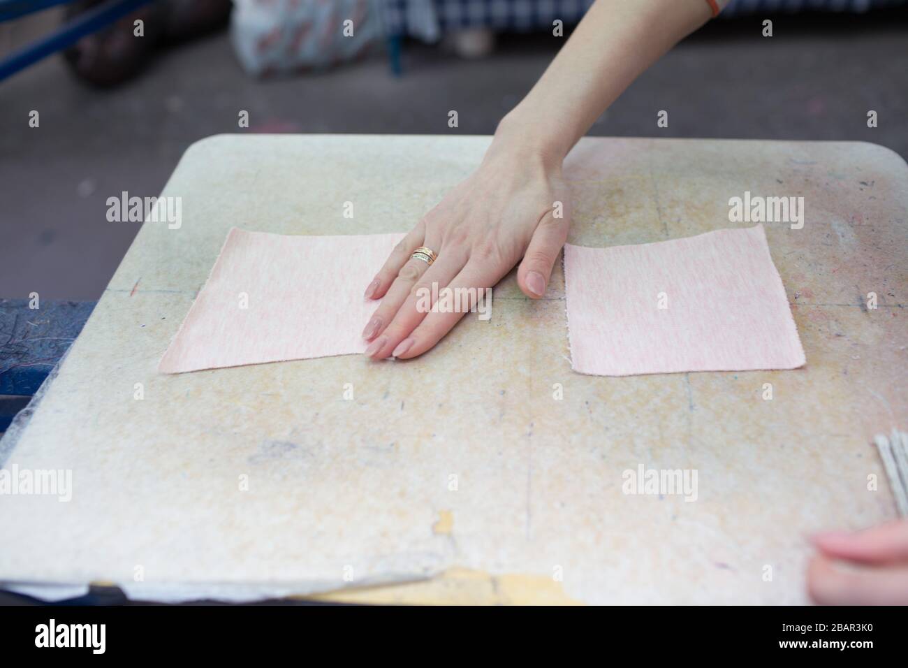 Silk screen printing. Serigraphy. Fabric and hand Stock Photo - Alamy