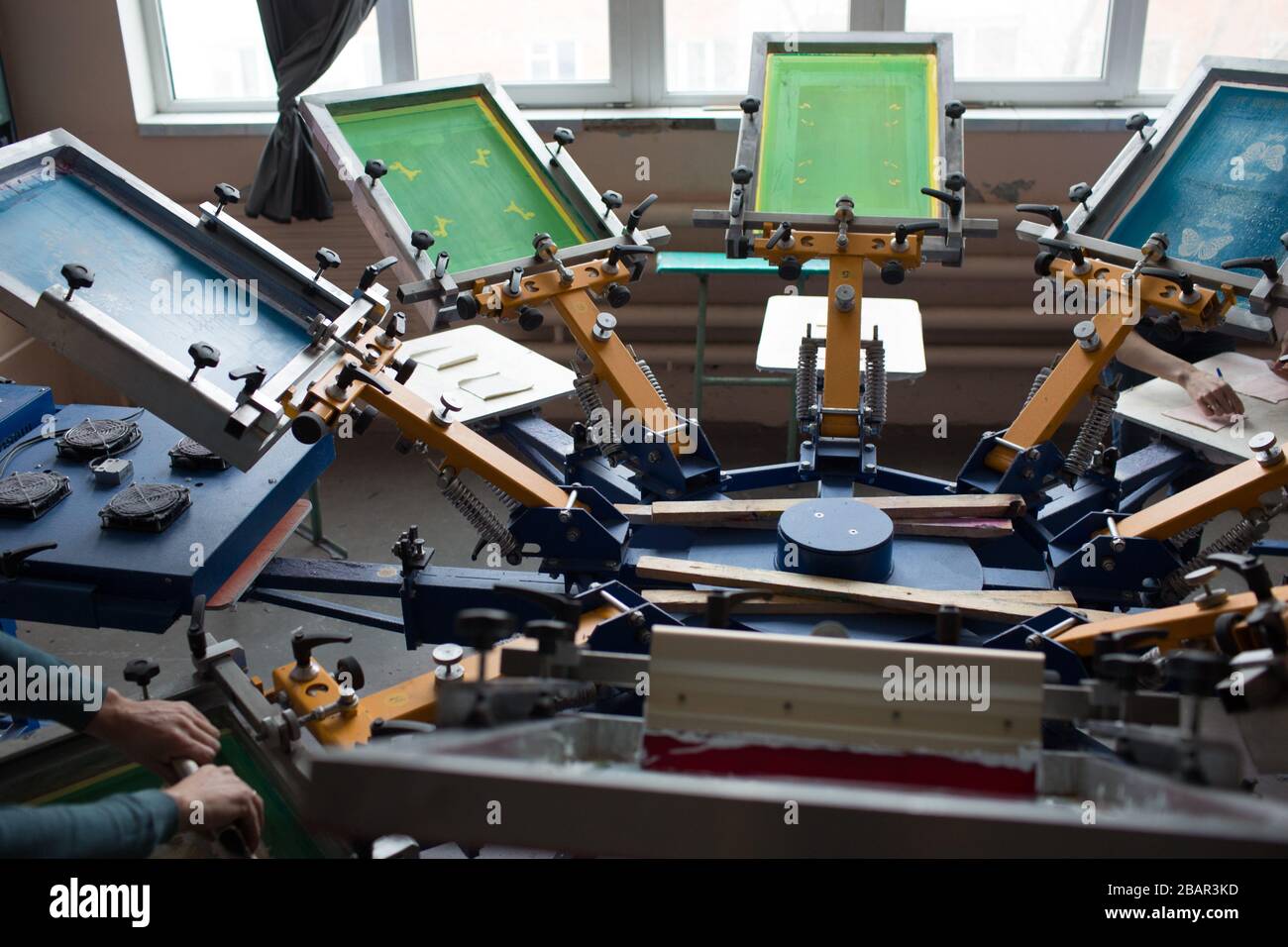 Silk screen printing. Serigraphy. Color paints and fabric. Carousel ...