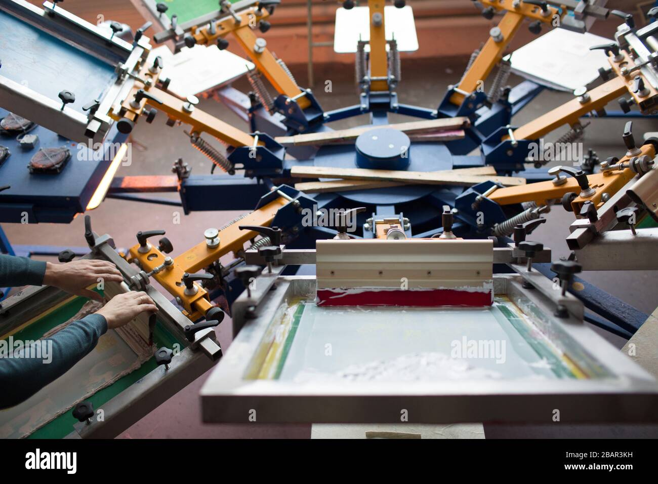 Silk screen printing. Serigraphy. Color paints and fabric. Carousel ...