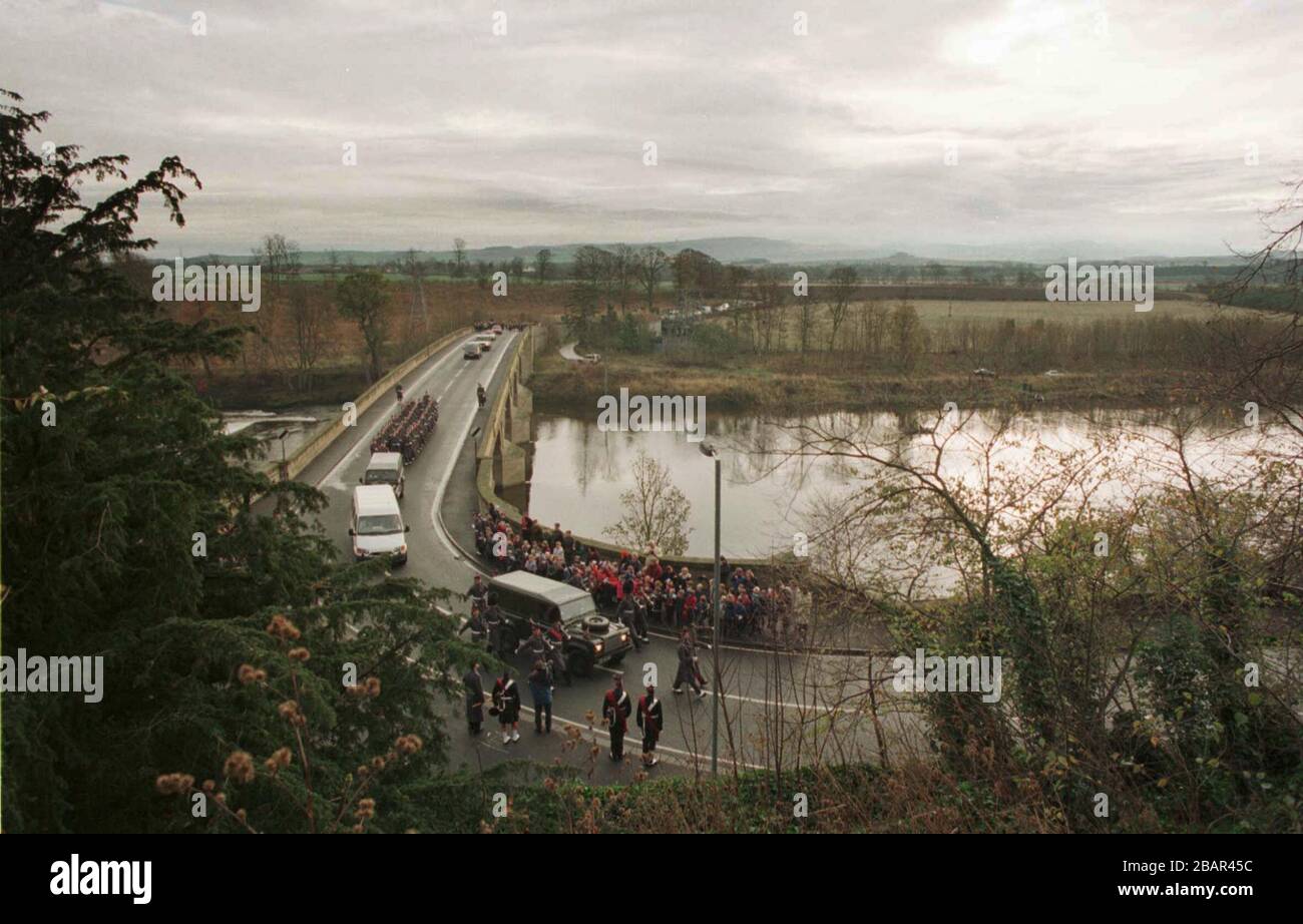 The Stone of Destiny is escorted off the bridge over the Tweed river at ...