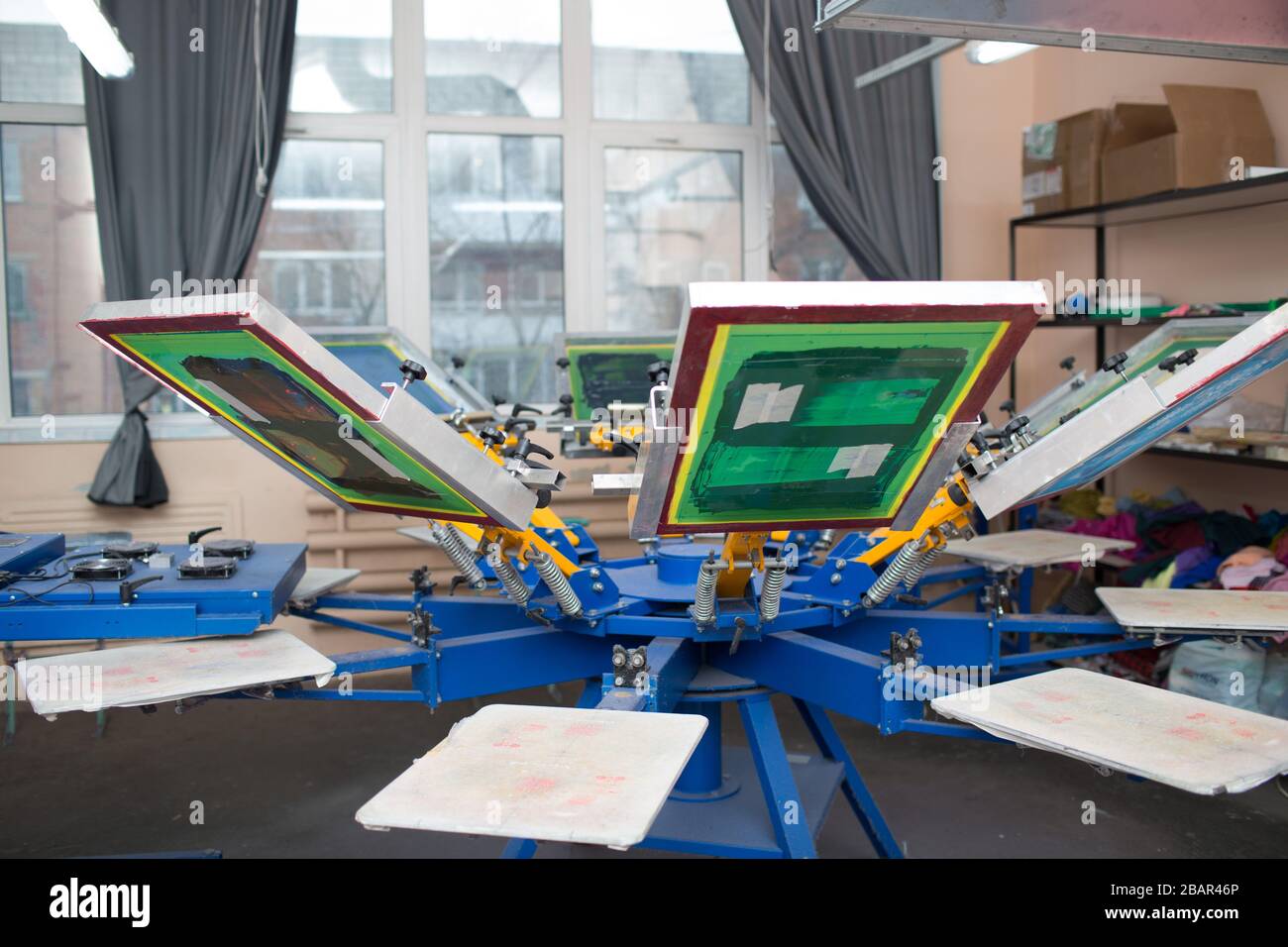 Silk screen printing. Serigraphy. Color paints and fabric. Carousel ...