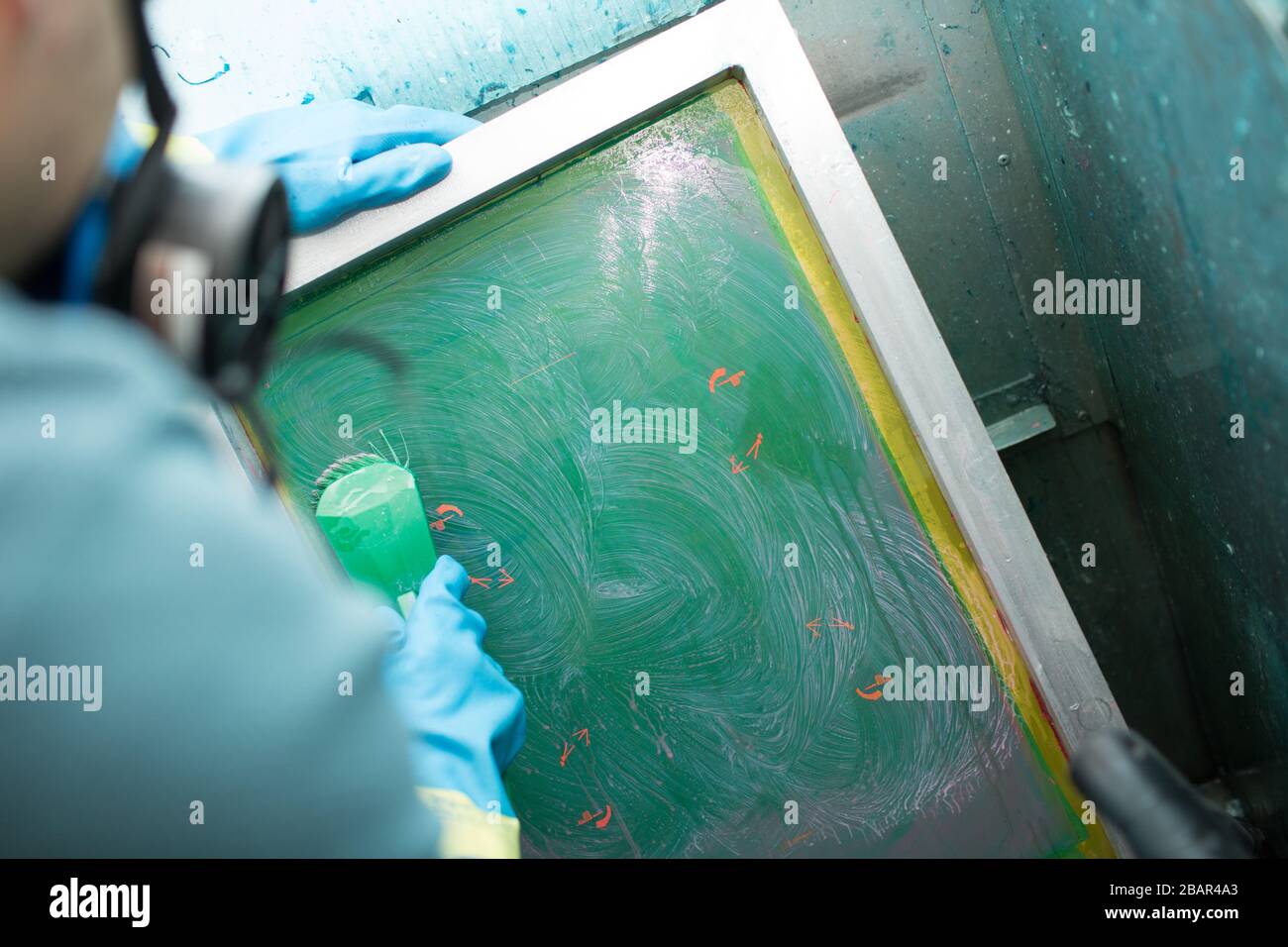 Silk screen printing. Serigraphy. Stencil washing Stock Photo - Alamy