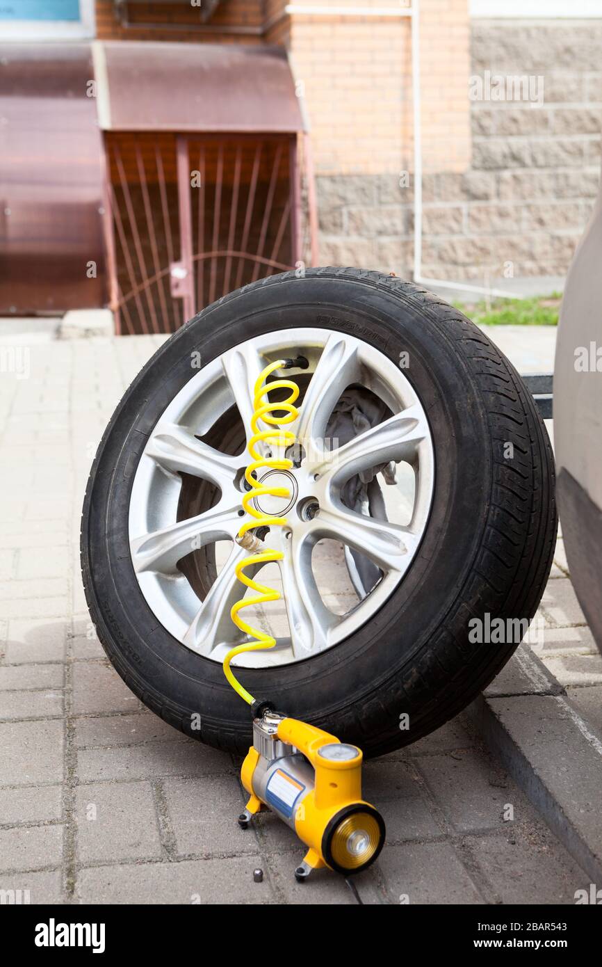 Dismounted car allow wheel rim with tire ready for inflate tyre with ...