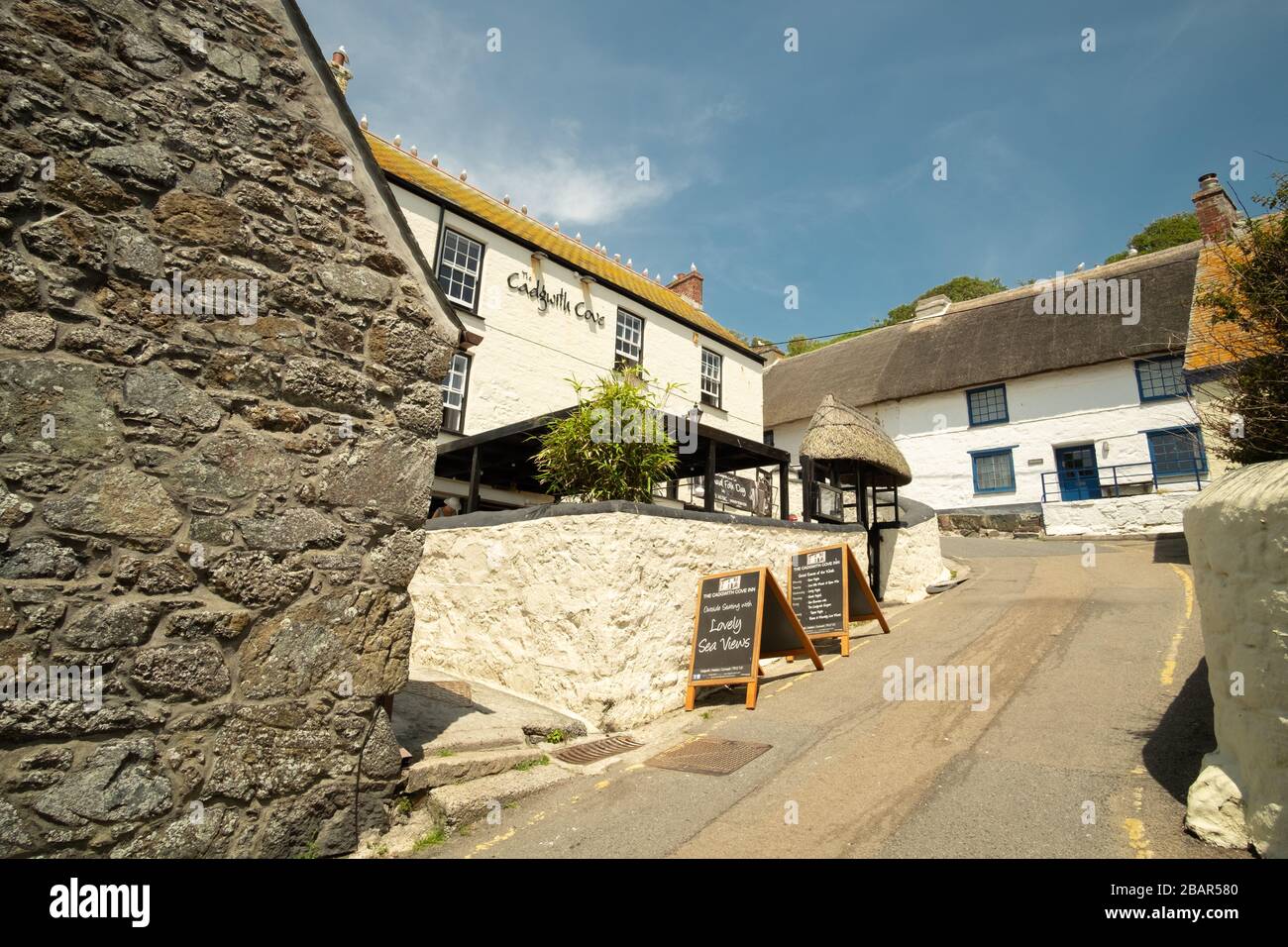 The traditional old Cadgwith Cove Inn hotel, in the small pretty ...