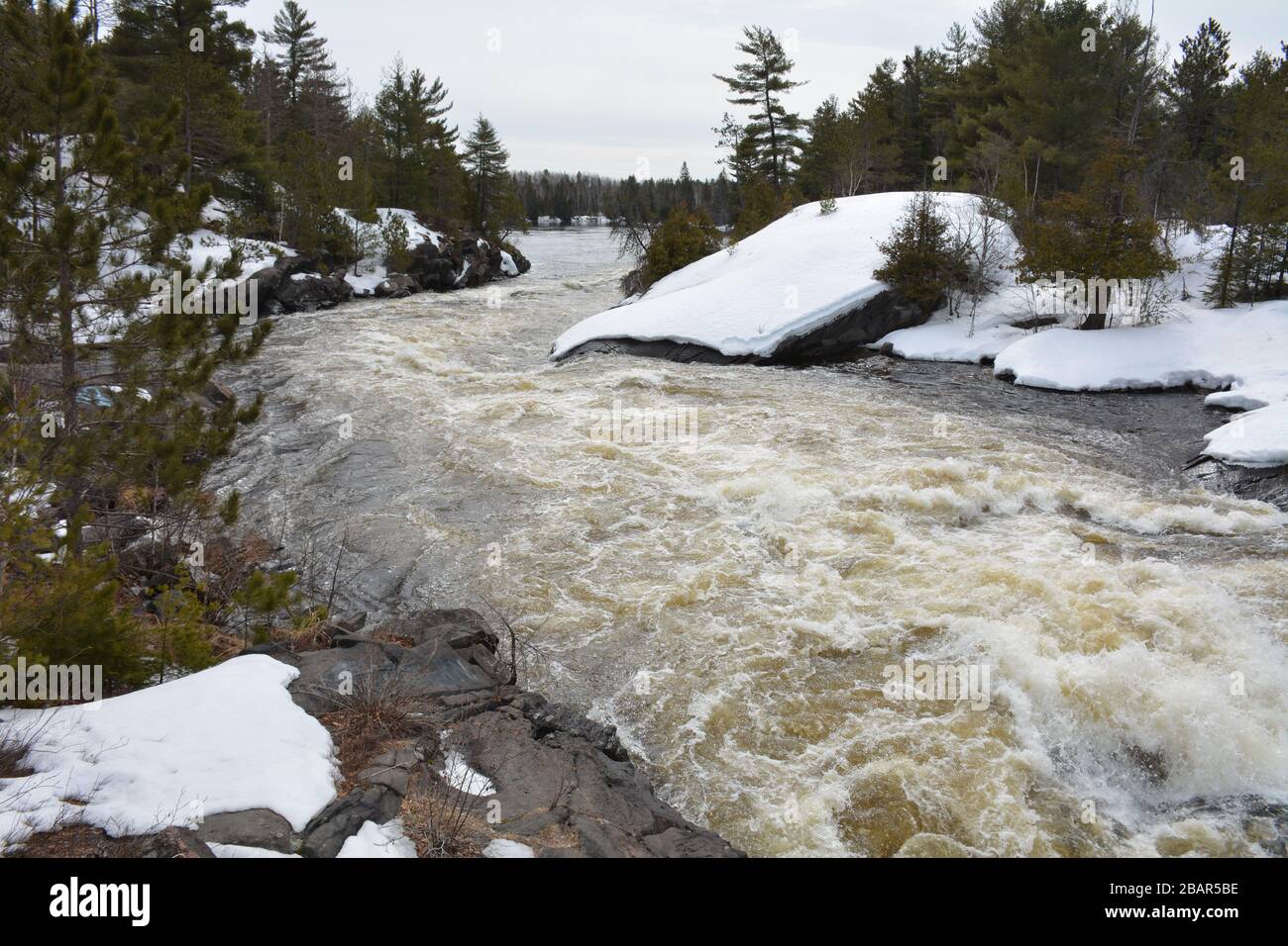Spring runoff and rapids on Northern Ontario river Stock Photo - Alamy