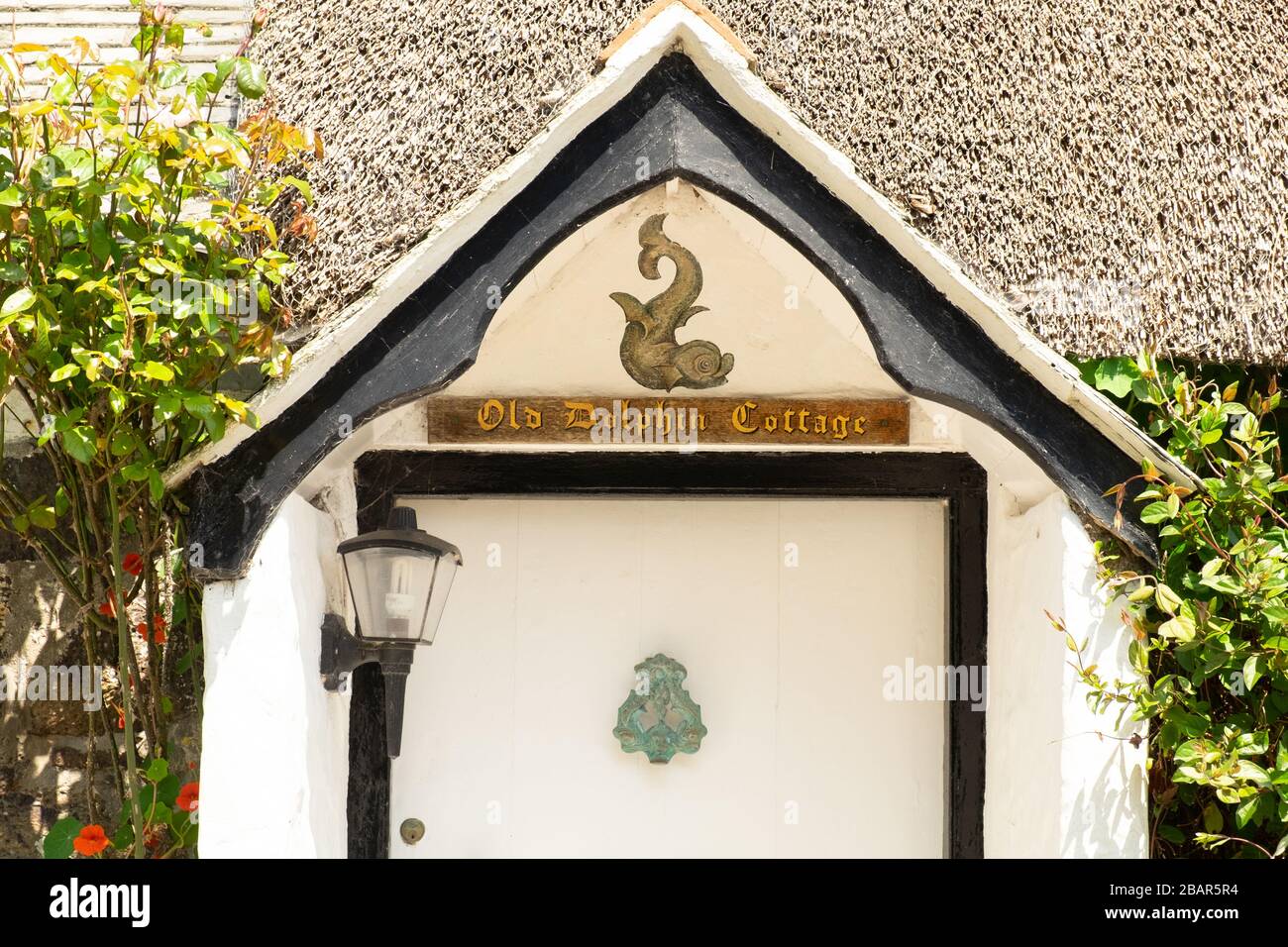 Porch and front door of "Old Dolphin Cottage", a traditional thatched ...
