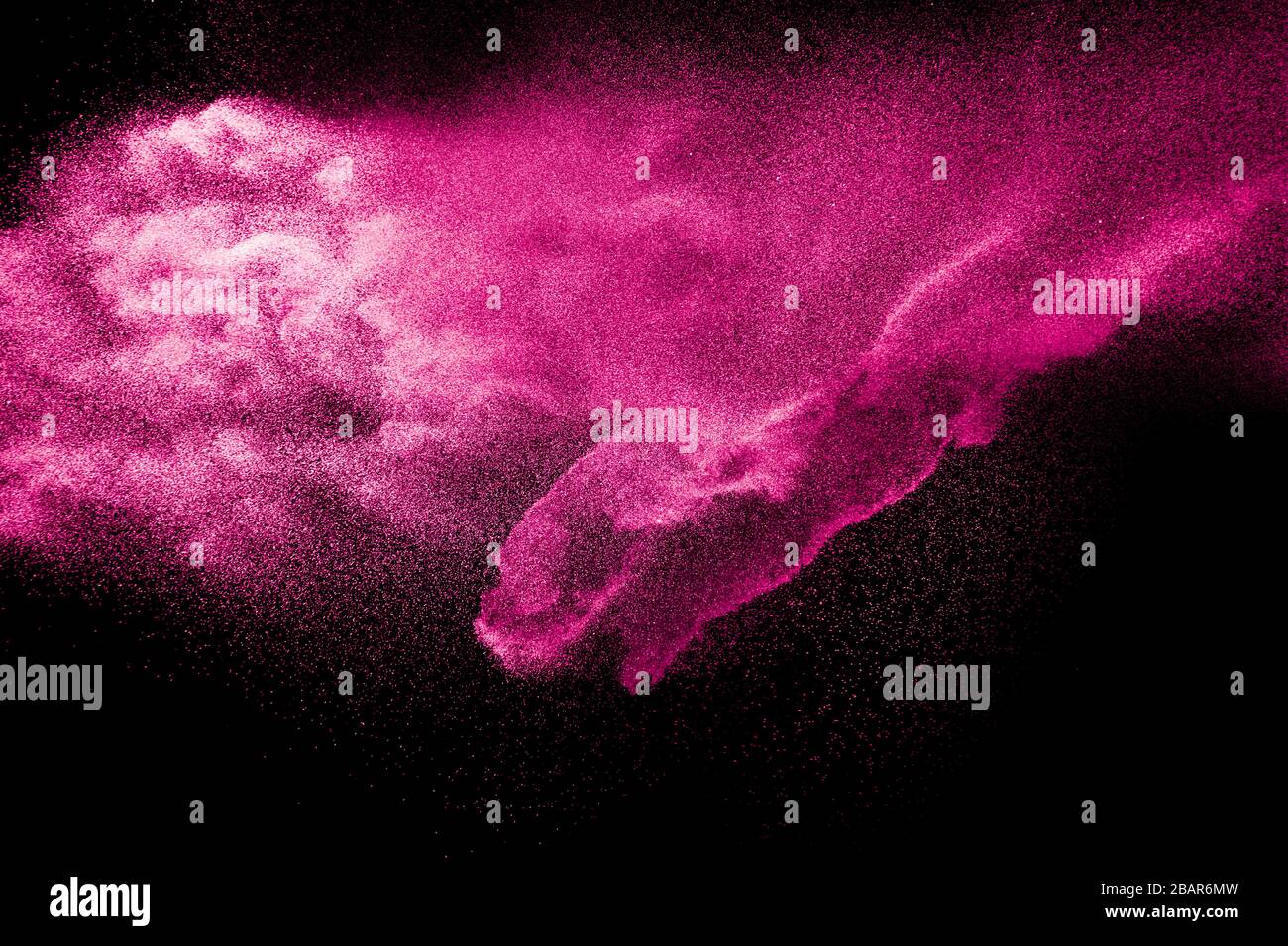 Pink dust particles splash on black background.Pink powder splash Stock ...