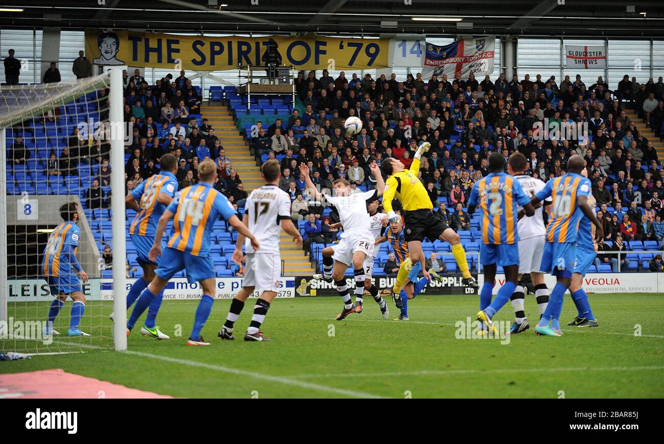 General view as Shrewsbury Town's goalkeeper Chris Weale comes for a ...