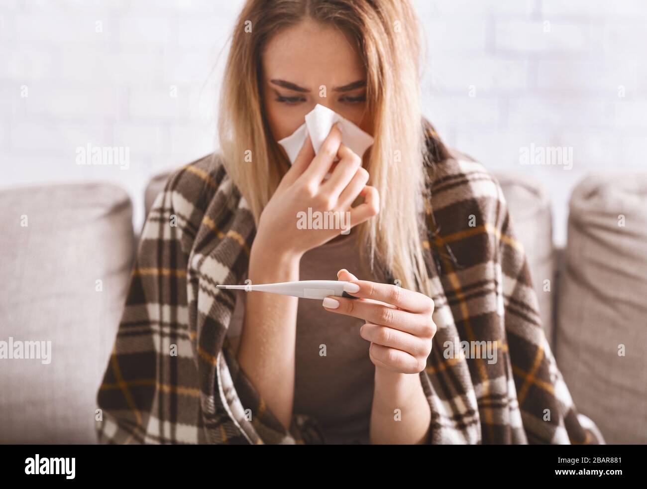 High temperature concept. Female isolation at home Stock Photo - Alamy