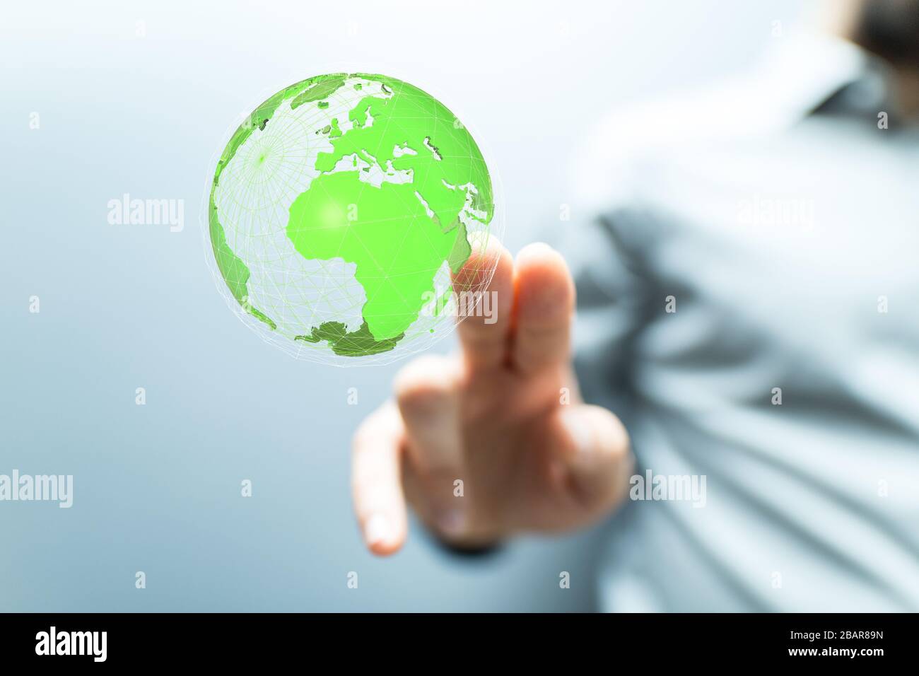Human Hand Holding The World In Hands Stock Photo - Alamy