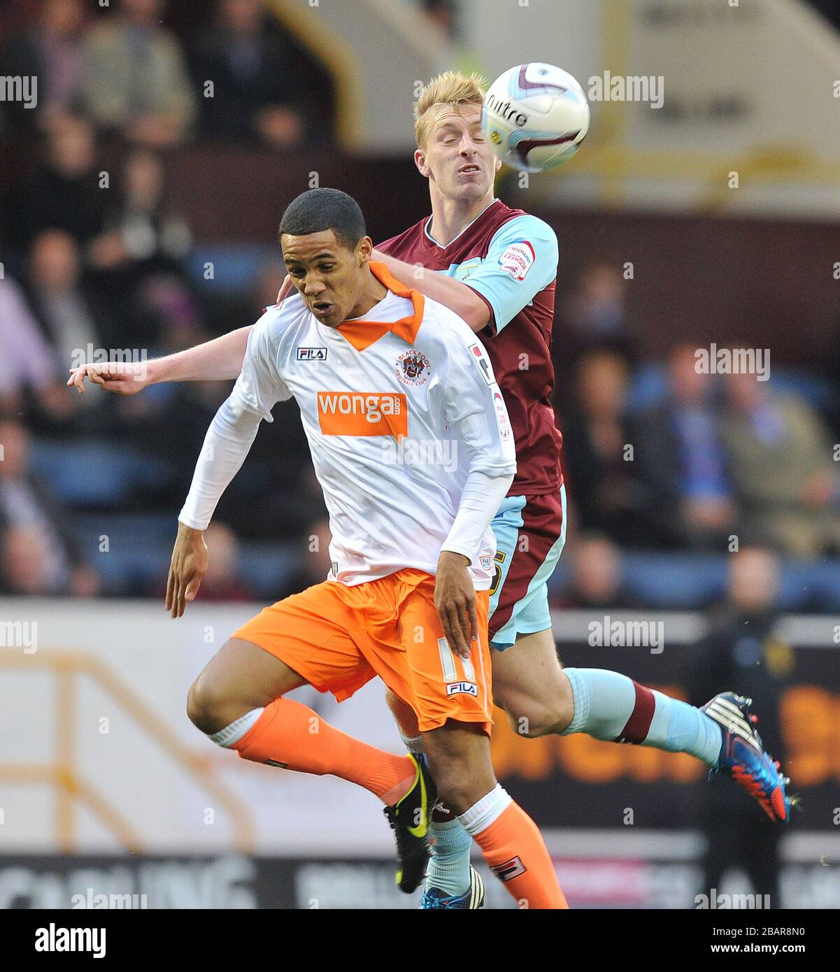 Blackpool's Thomas Ince (left) and Burnley's Luke O'Neill battle for ...