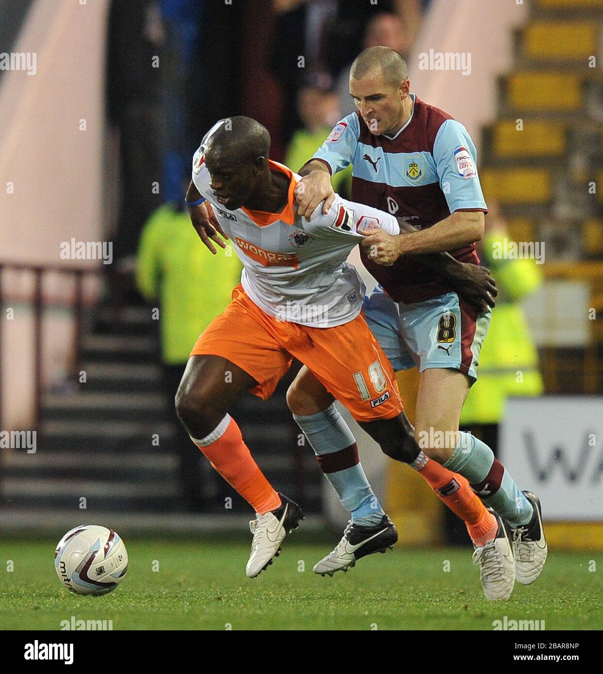 Blackpools isaiah osbourne left burnleys dean battle for the ball hi ...