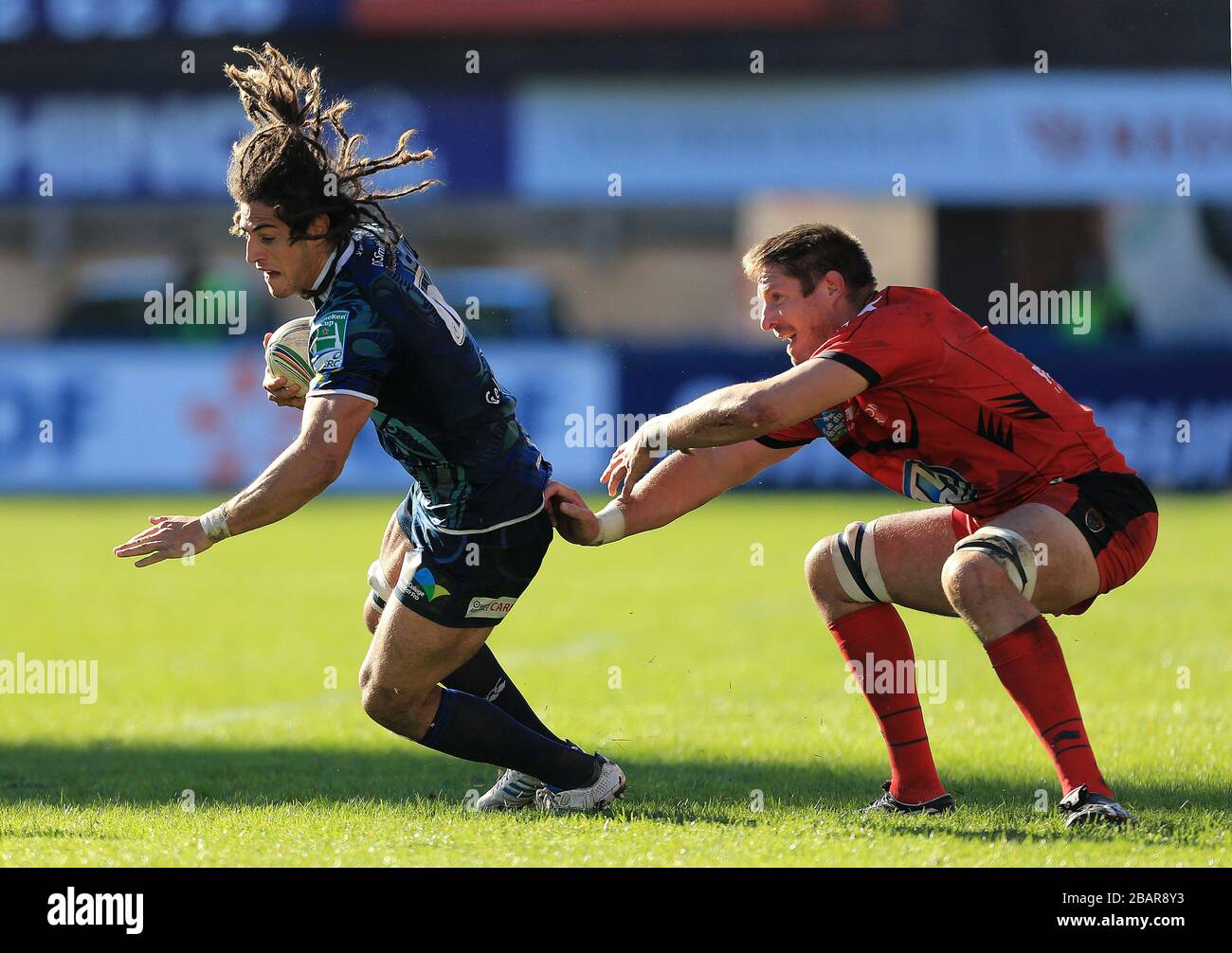 Cardiff Blues' Josh Navidi (left) and Toulon's Bakkies Botha in action ...