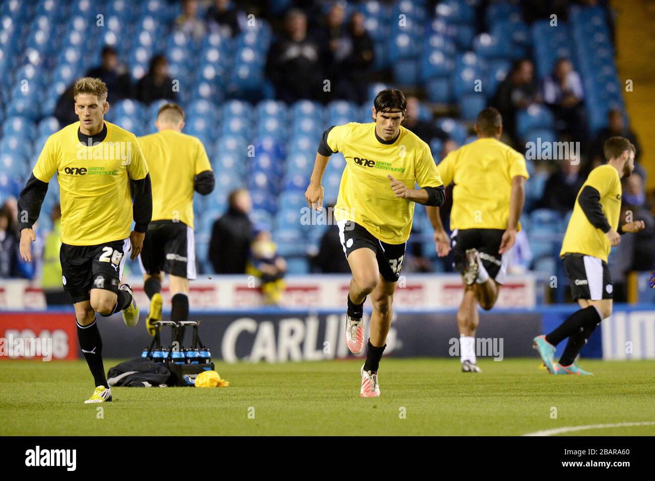 Sheffield Wednesday's Miguel Angel Llera (centre) and Daniel Jones ...