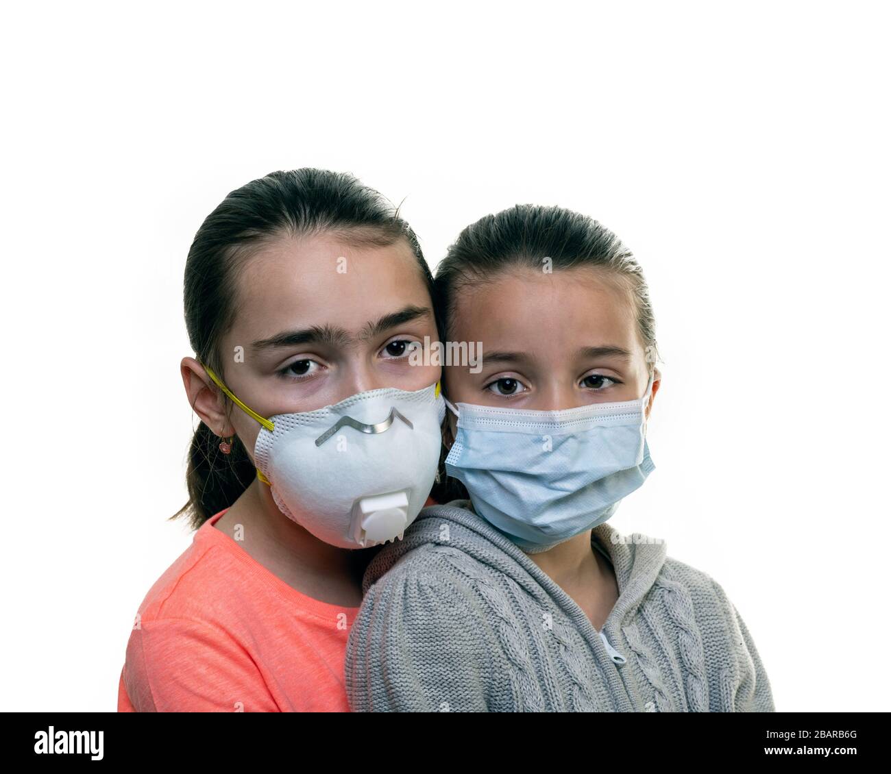 Sisters wearing a mask hi-res stock photography and images - Alamy