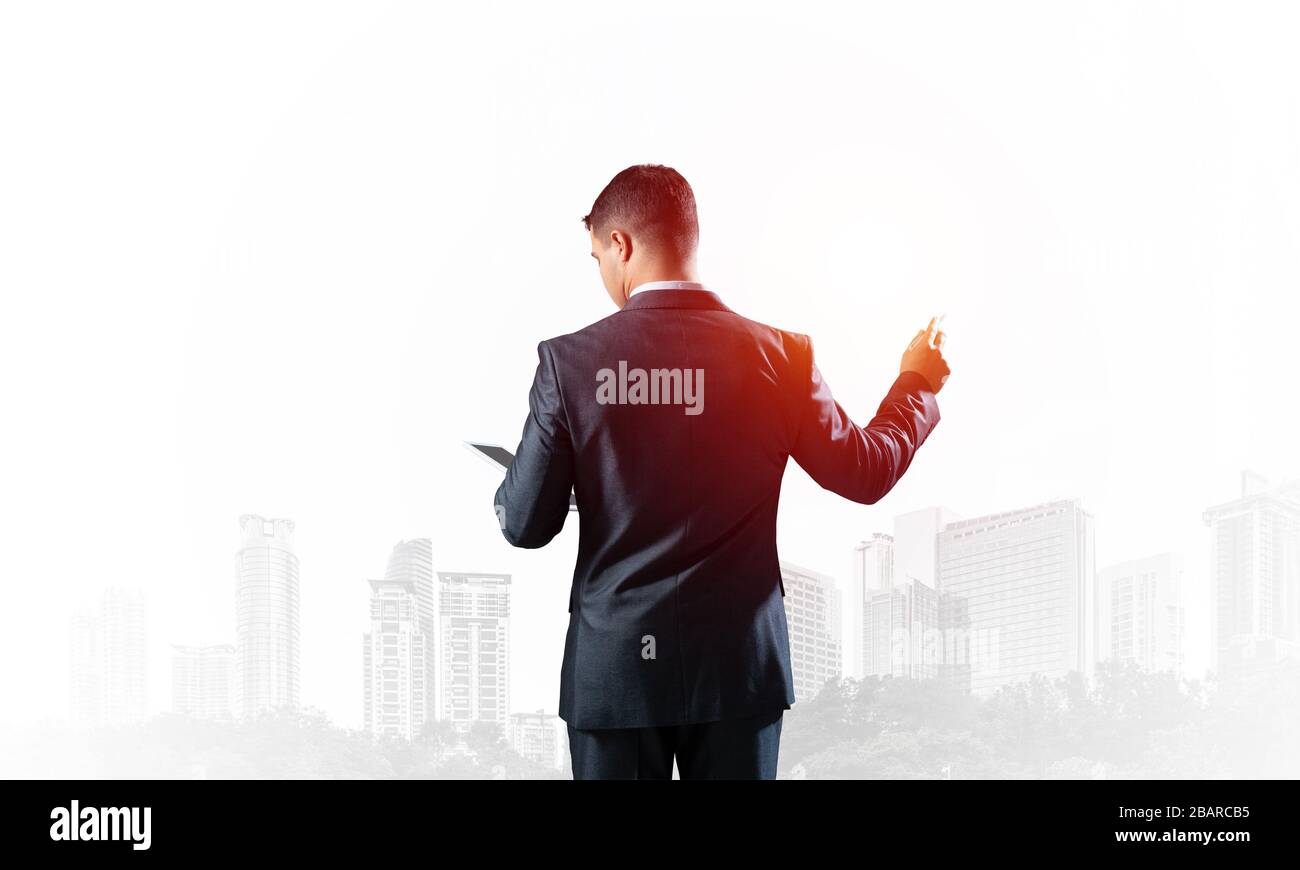 Back view of man in business suit and tie Stock Photo - Alamy
