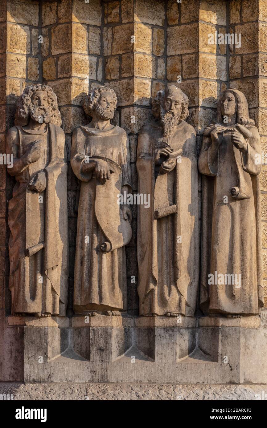 4 apostles sculptures outside a church in Maastricht which were ...
