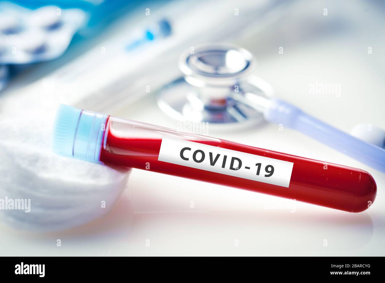 A test tube with a blood test in a medical laboratory. Background with ...